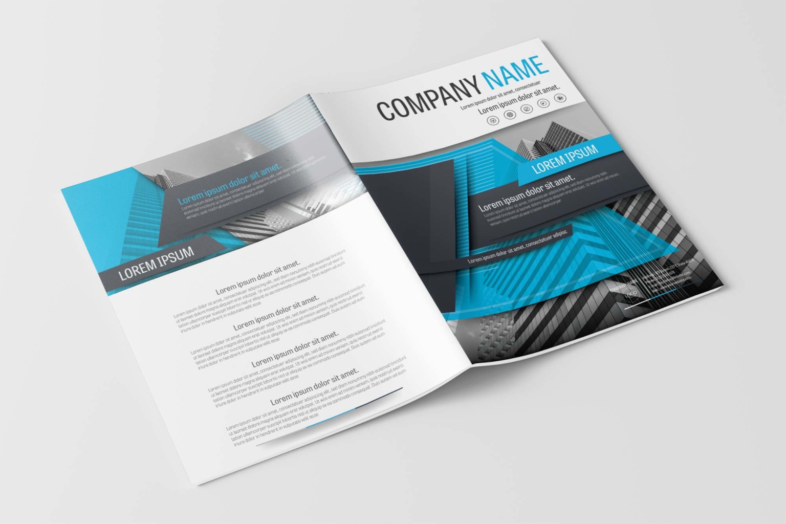 Free brochure template with blue shapes design.